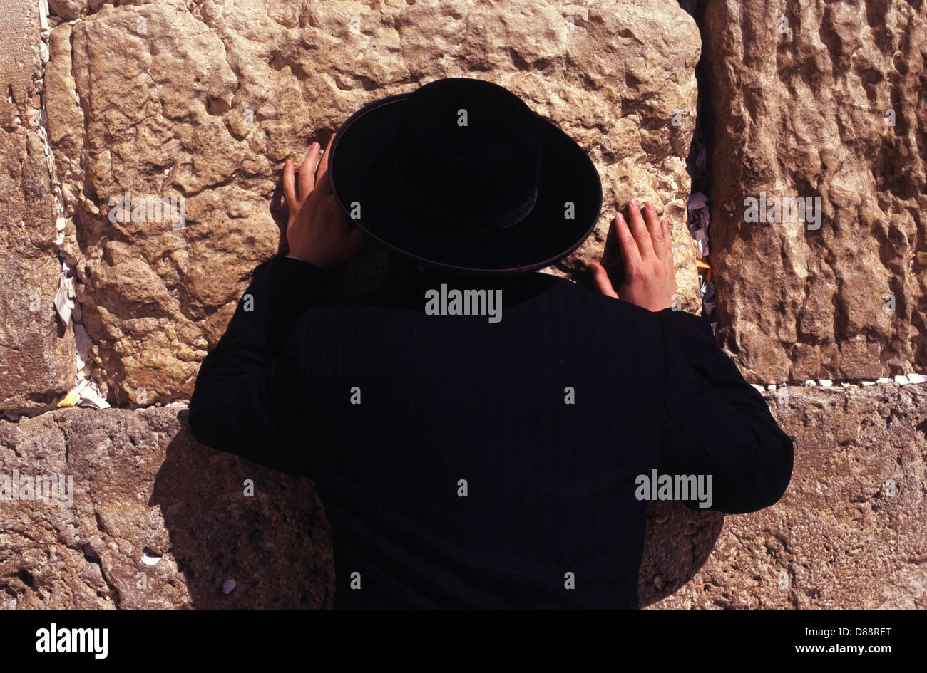 Ultra orthodox Jewish man mourning in the Western or wailing wall on ...