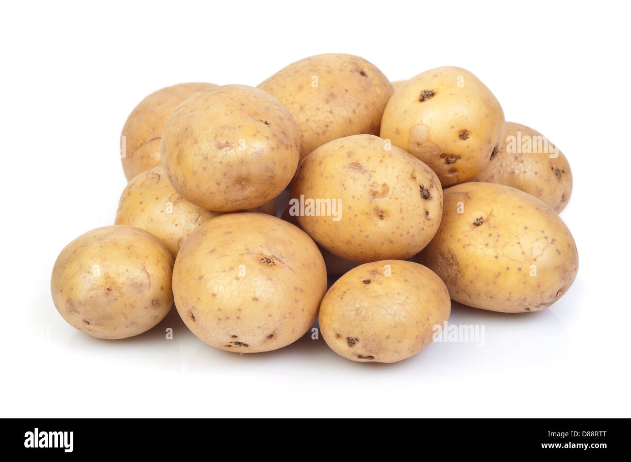 young potatoes on white Stock Photo - Alamy