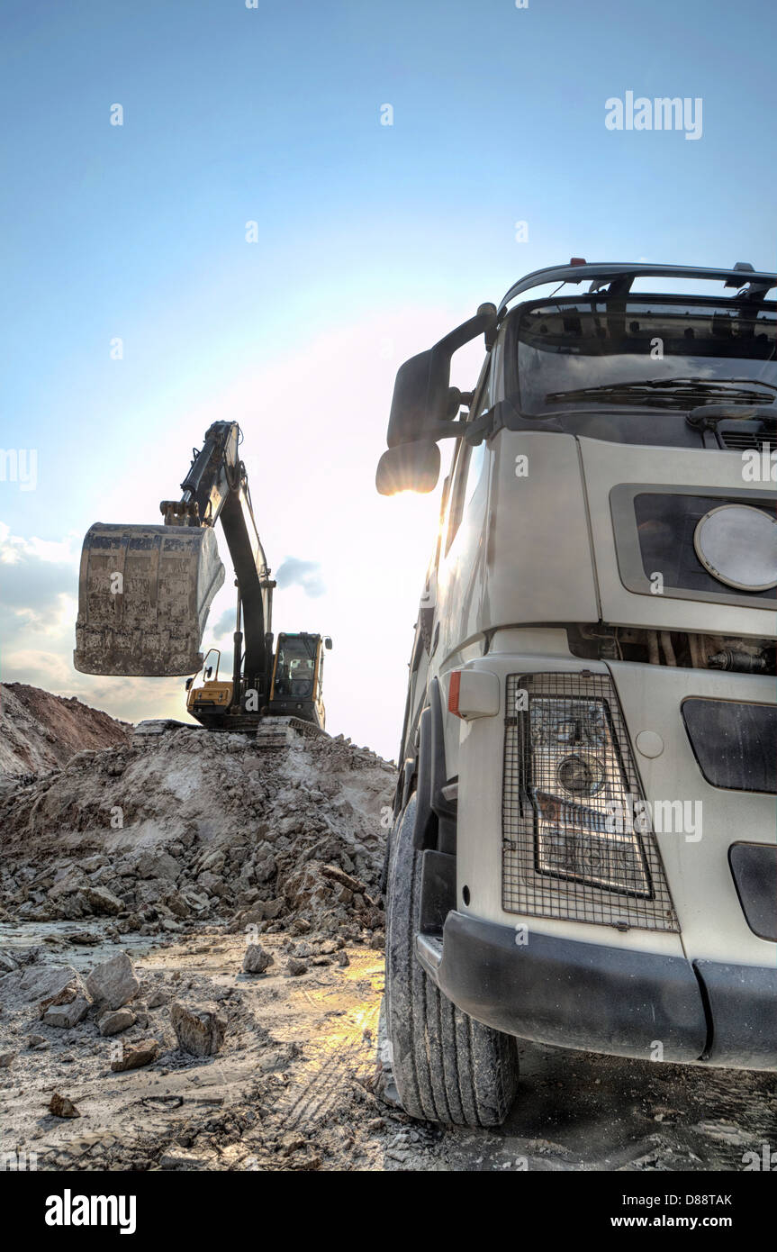 loading a large lorry building material, clay pit Stock Photo - Alamy