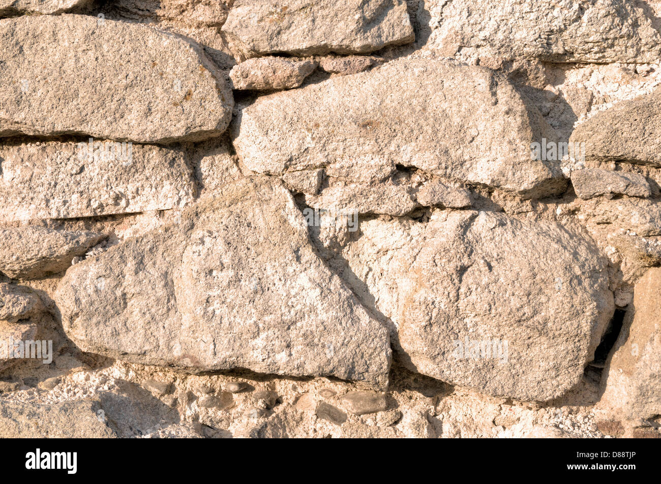 surface of the stone wall with cracks Stock Photo - Alamy