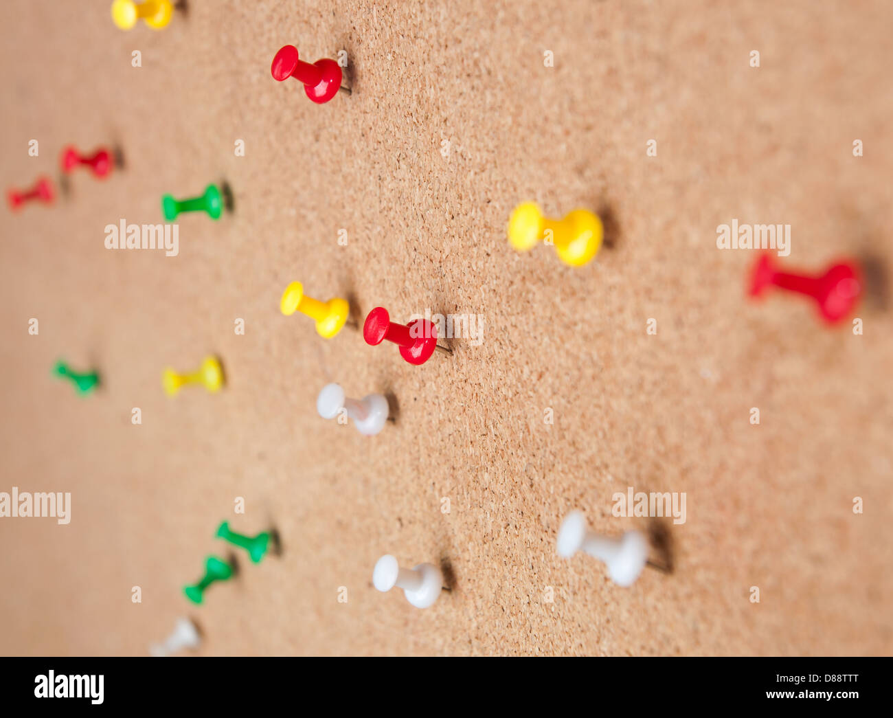 cork tablet with drawing pins Stock Photo - Alamy
