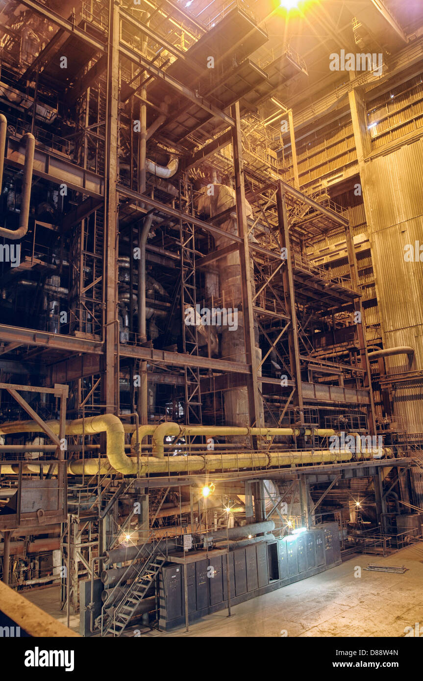 Pipes, tubes, machinery and steam turbine at a power plant Stock Photo ...