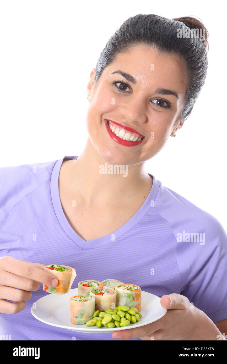 Model Released. Young Woman Eating Tuna Salad Bites Stock Photo - Alamy