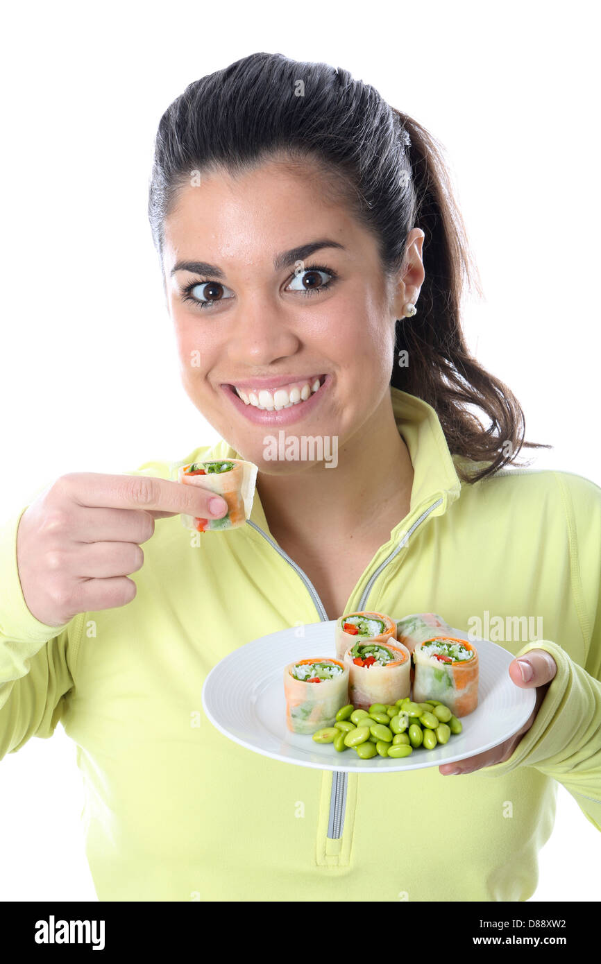 Model Released. Young Woman Eating Tuna Salad Bites Stock Photo - Alamy
