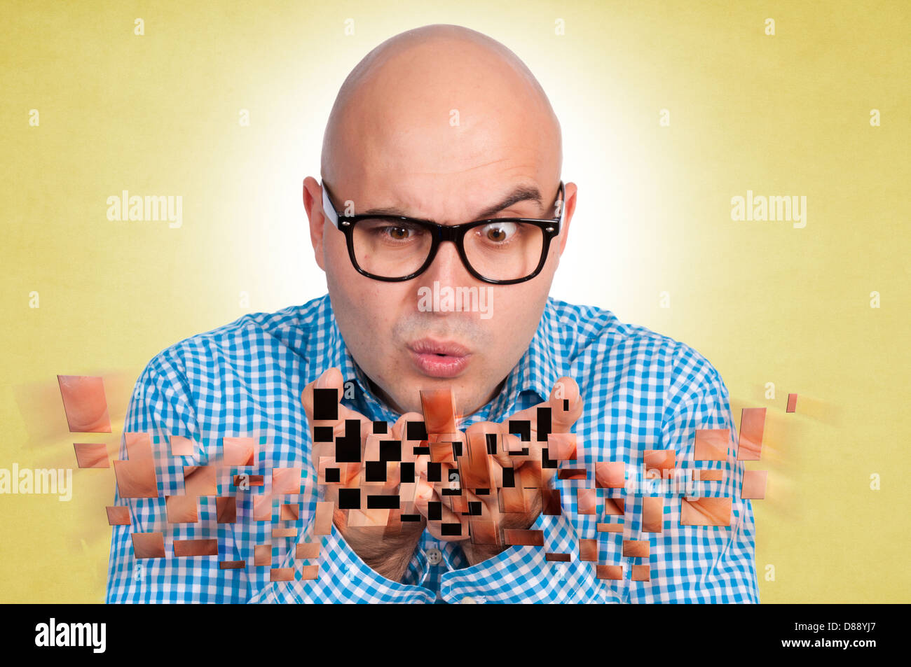 Man blowing his hand Stock Photo - Alamy
