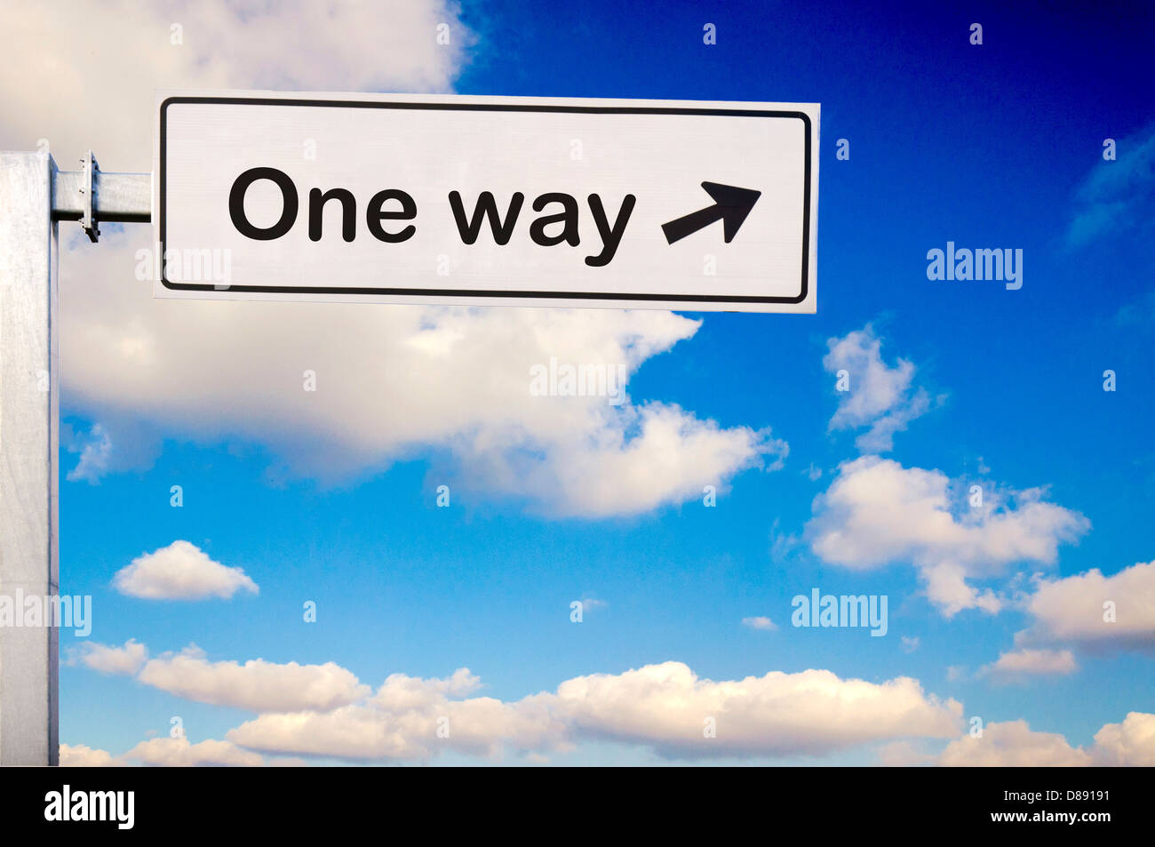 One way sign over the sky Stock Photo - Alamy