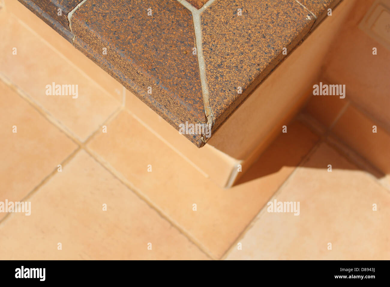 Corner of tiled terrace seat Stock Photo - Alamy