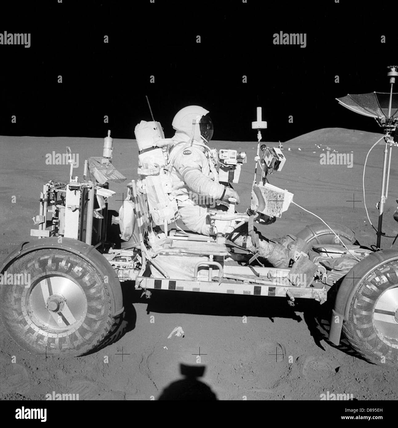 Astronaut Scott is seen on the Lunar Roving Vehicle (LRV) during the ...