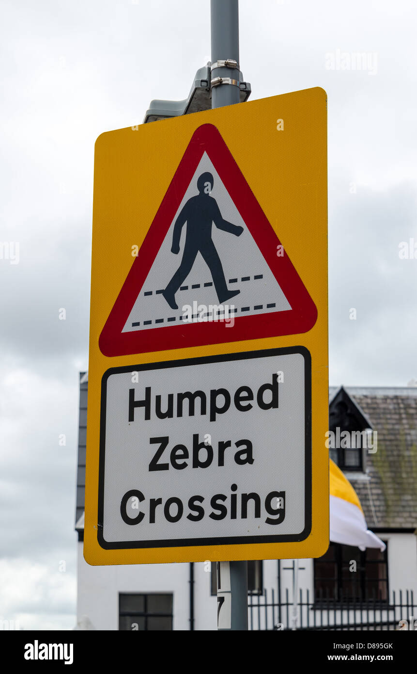 Road traffic sign warning of humped zebra crossing Stock Photo - Alamy