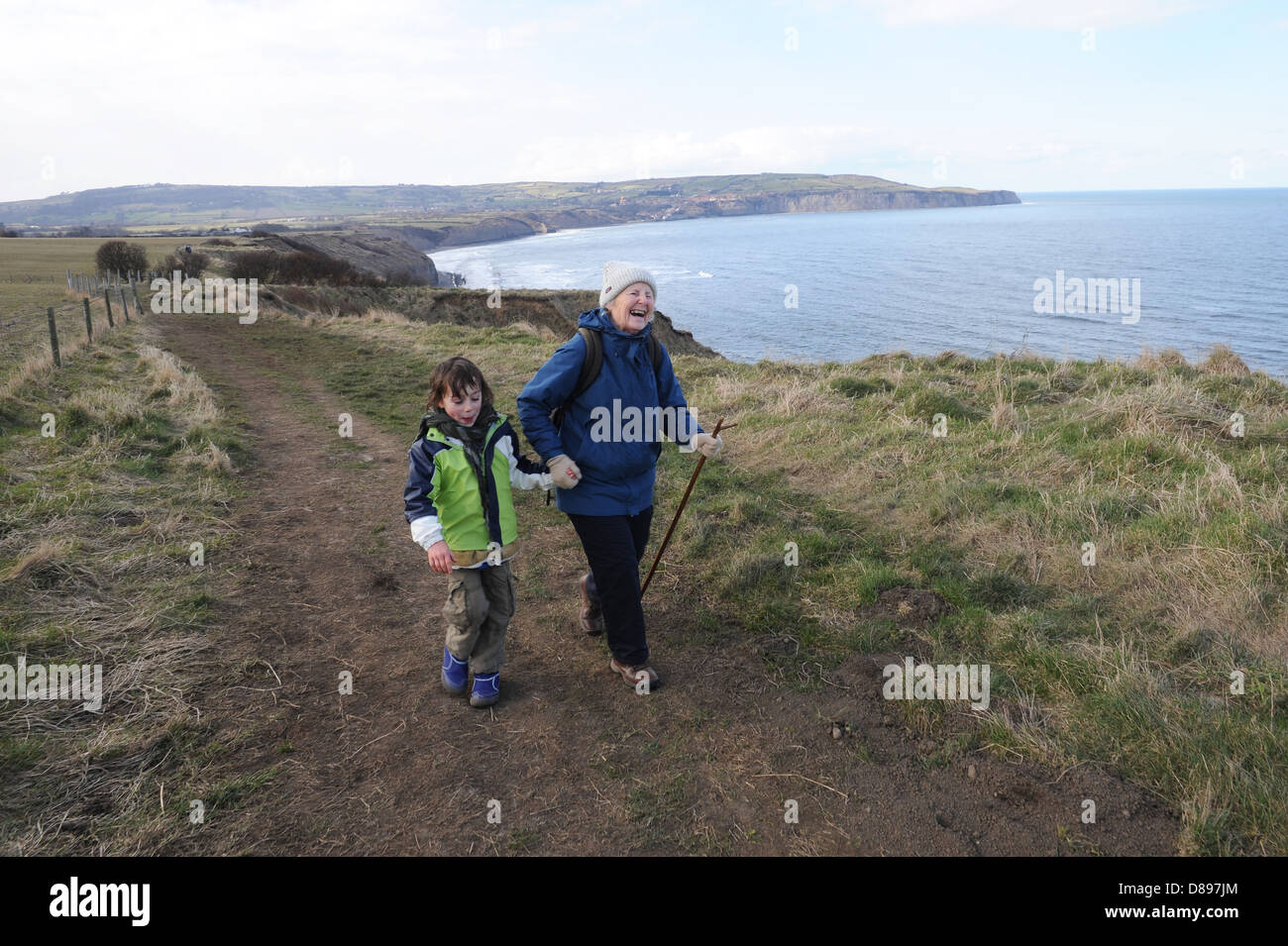 Grandparent and grandson rambling together on part of the Cleveland way ...