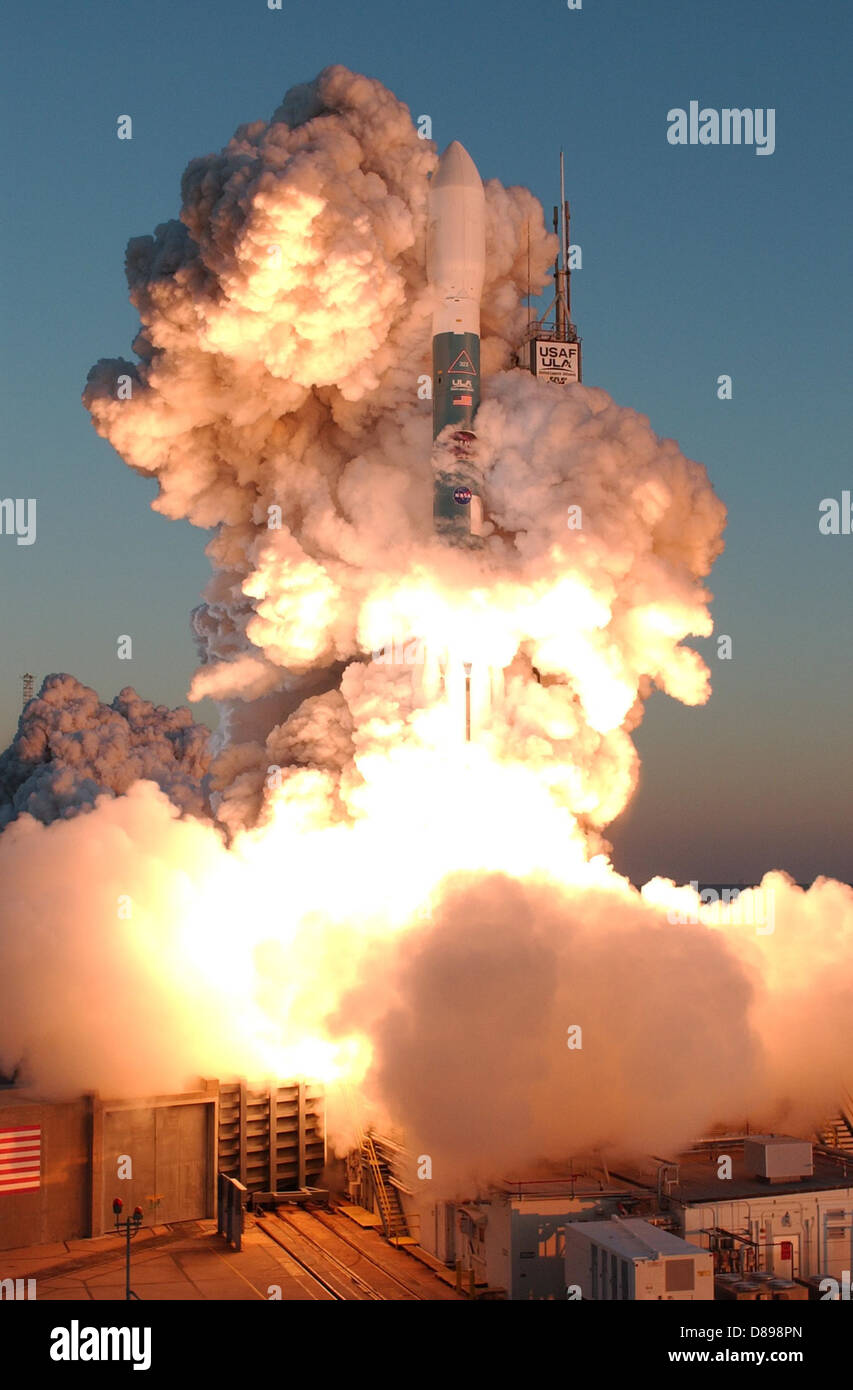 The Delta II 7925-10C rocket is launched, sending clouds of smoke as it ...