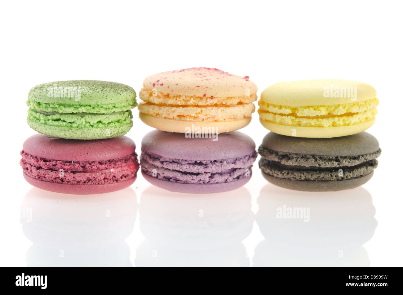 Colorful macaroon stack on white background with reflection Stock Photo ...