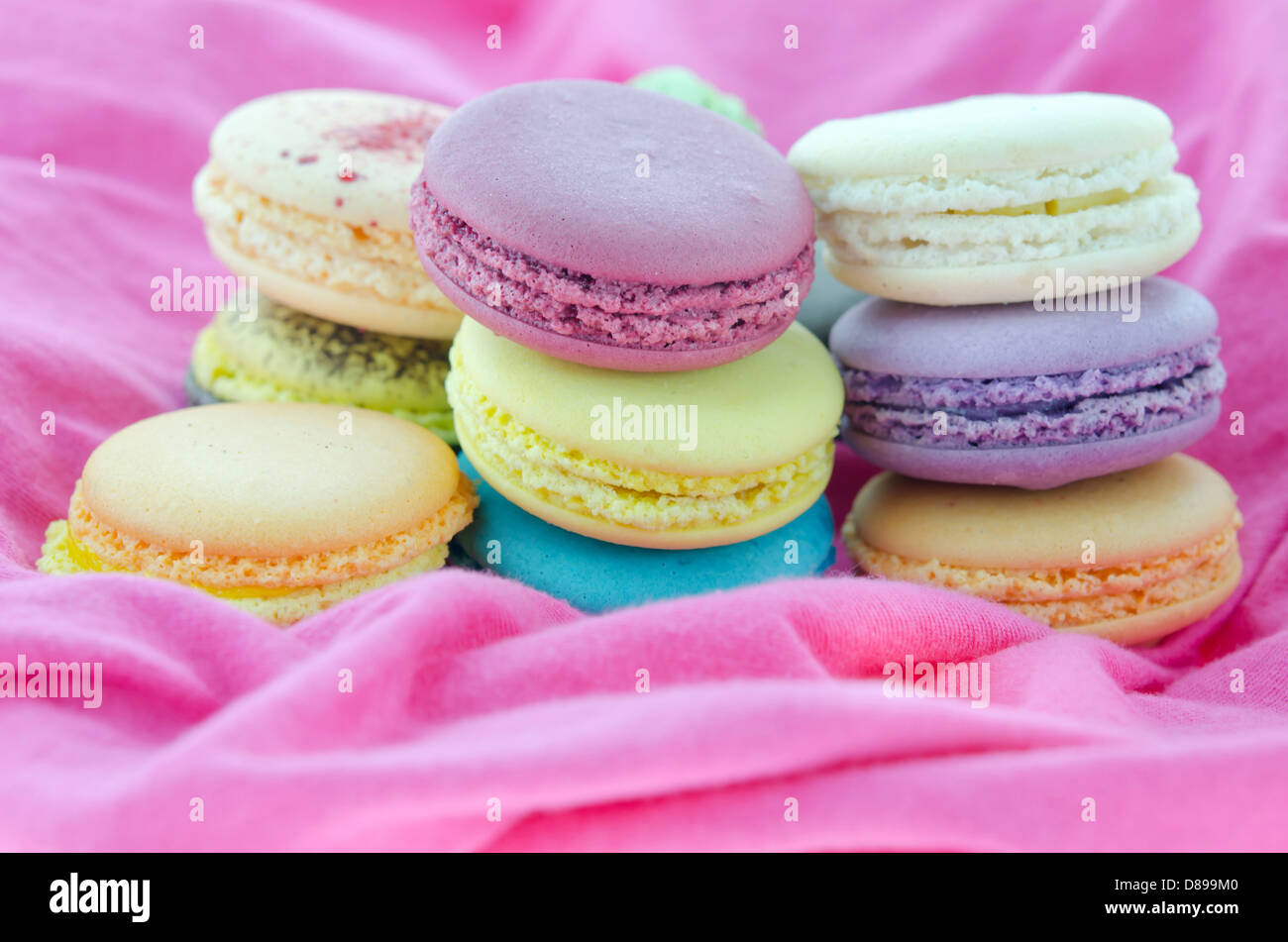 traditional colorful french macaroons stack on pink Stock Photo - Alamy