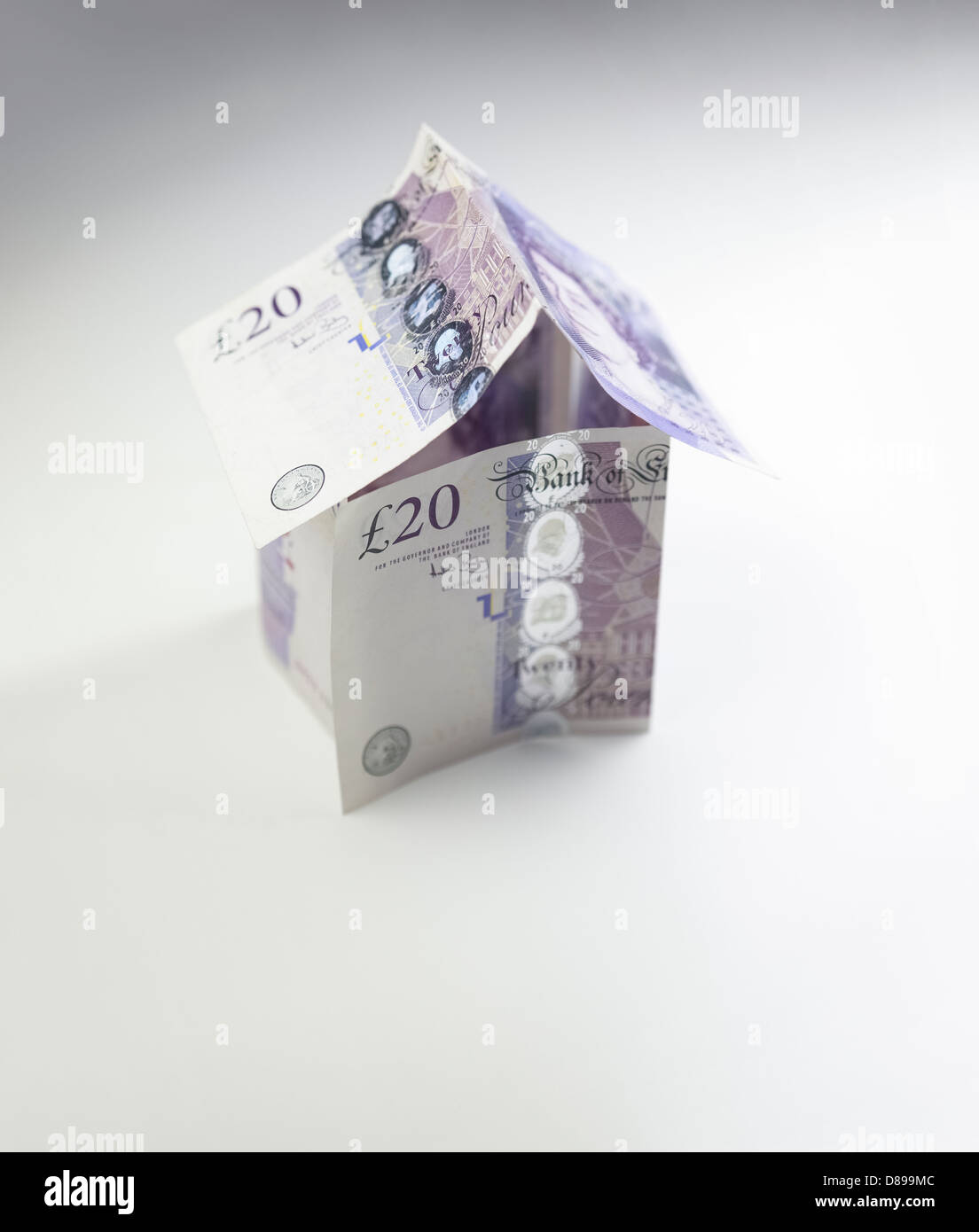 House and pound notes hi-res stock photography and images - Alamy