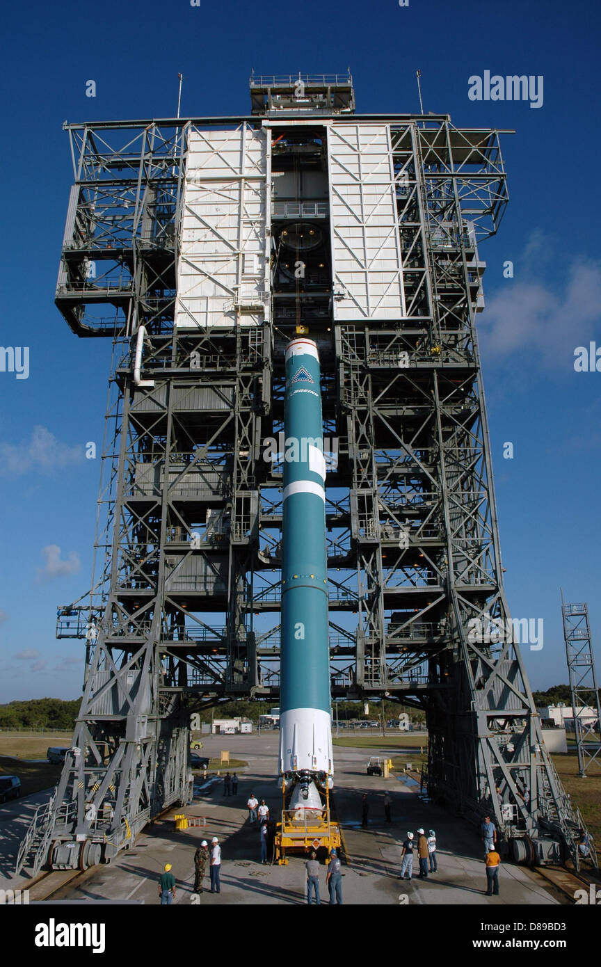 The Delta II rocket’s first stage is erected at the launch site, ready ...