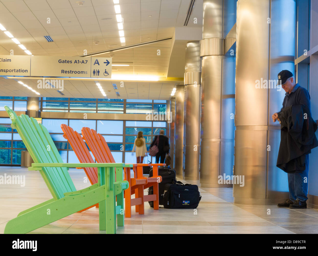 Traveler Waits in concourse Area, Myrtle Beach International Airport ...