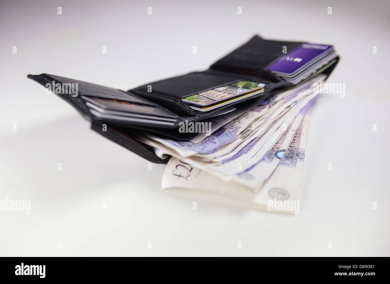 A wallet full of twenty pound notes Stock Photo - Alamy