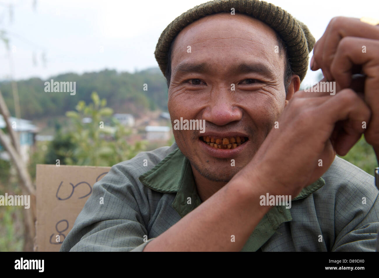 Palaung man just sitting Stock Photo - Alamy