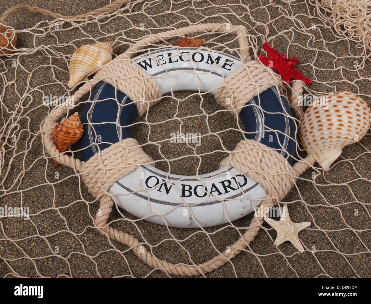 safe belt in the net on the sand beach Stock Photo - Alamy
