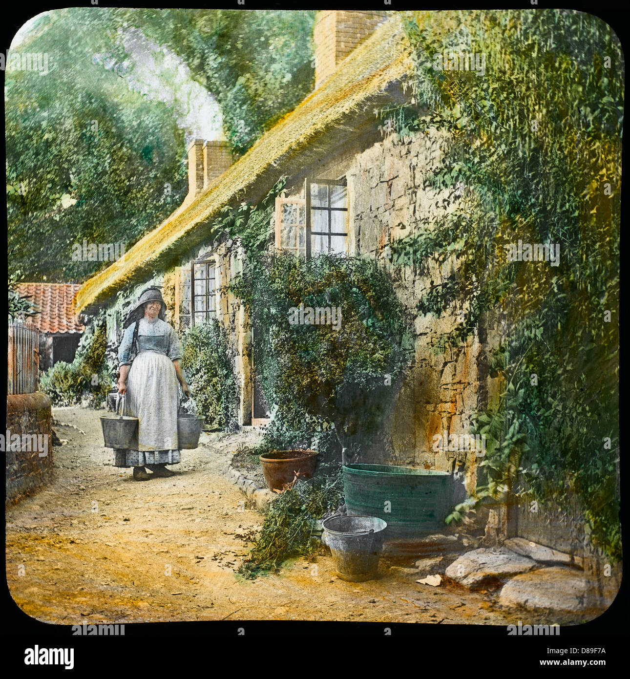 FETCHING WATER FROM WELL Stock Photo - Alamy