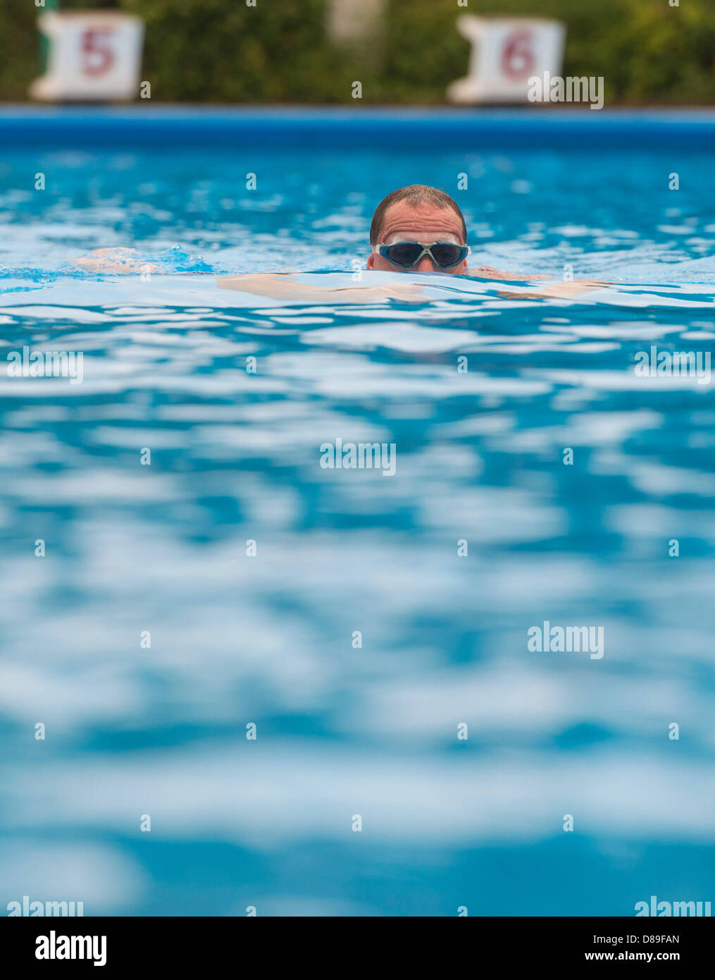 A single swimmer is seen in the Carl-Benz-Bad in Mannheim, Germany, 22 ...