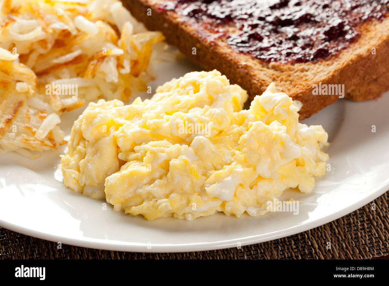 Homemade Wholesome American Breakfast with eggs, toast, and hashbrowns ...