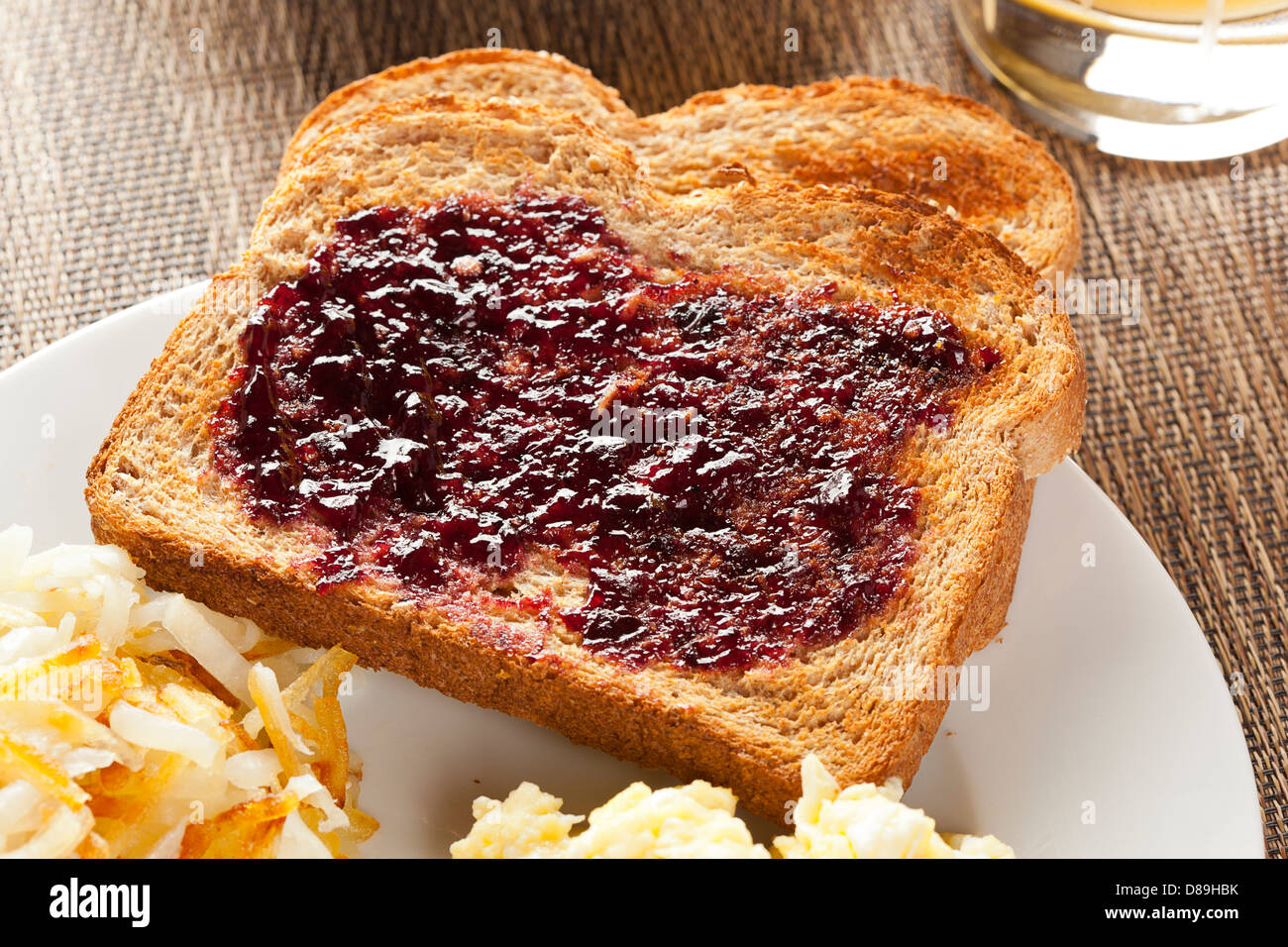 Homemade Wholesome American Breakfast with eggs, toast, and hashbrowns ...