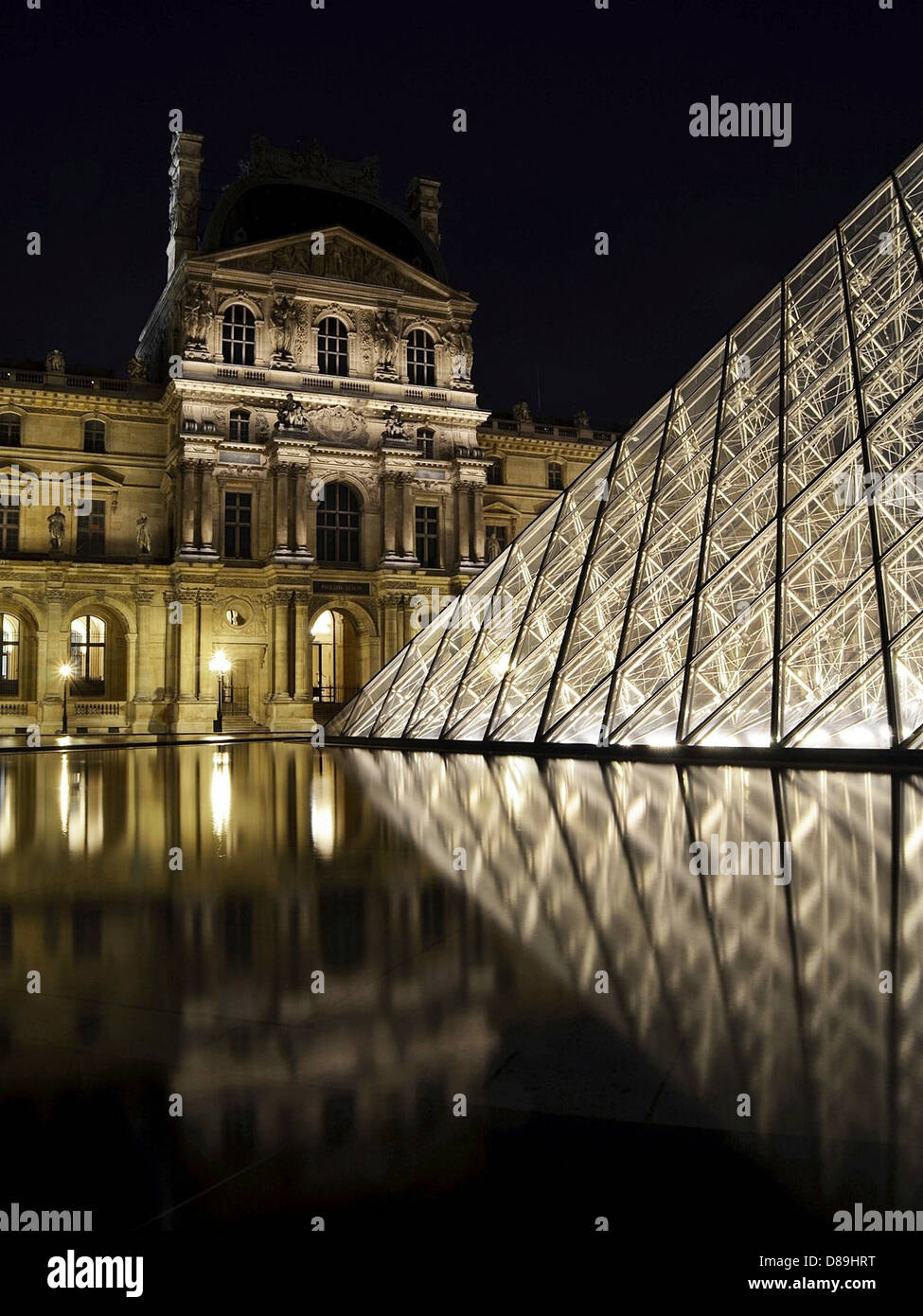 The Louvre Pyramid in Paris is an iconic architectural landmark. This ...