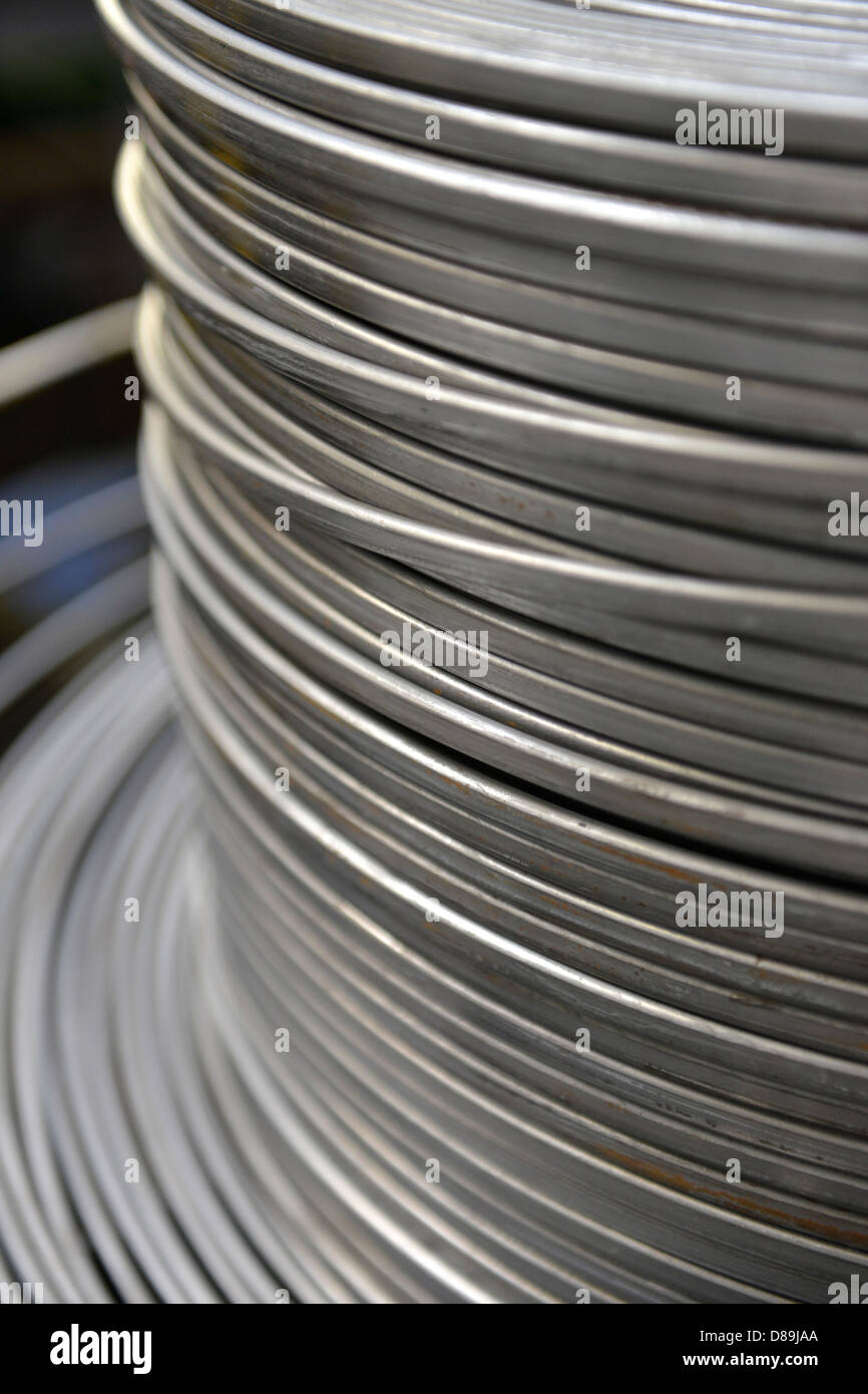 A coil or roll of industrial steel Stock Photo - Alamy