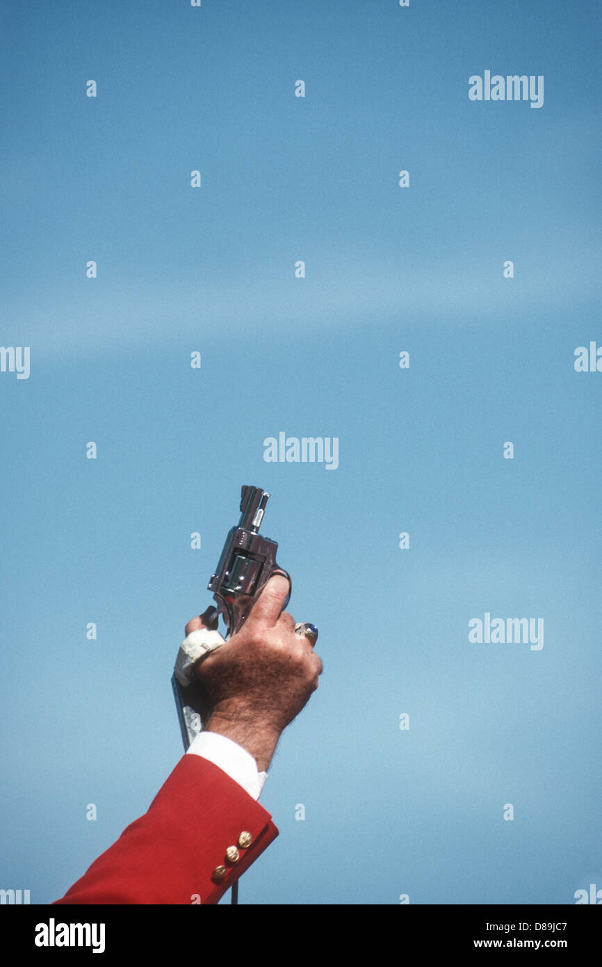 Detail of f track and field relay starter's pistol Stock Photo - Alamy