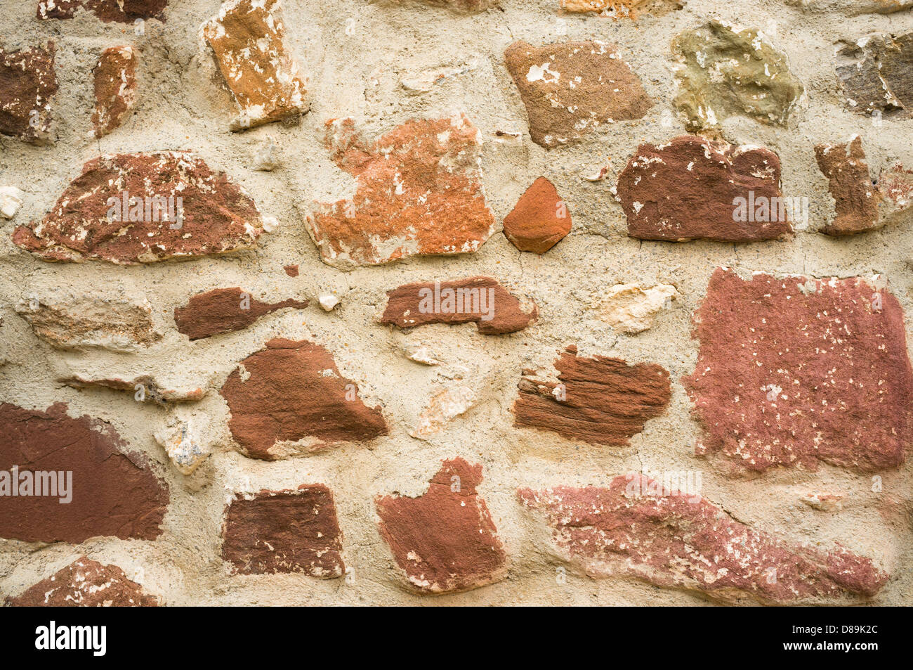 Old and very weathered stone wall in a full frame take Stock Photo - Alamy