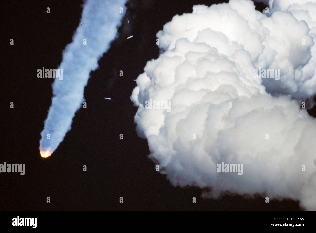 As part of the Delta II rocket's launch sequence, six solid rocket ...