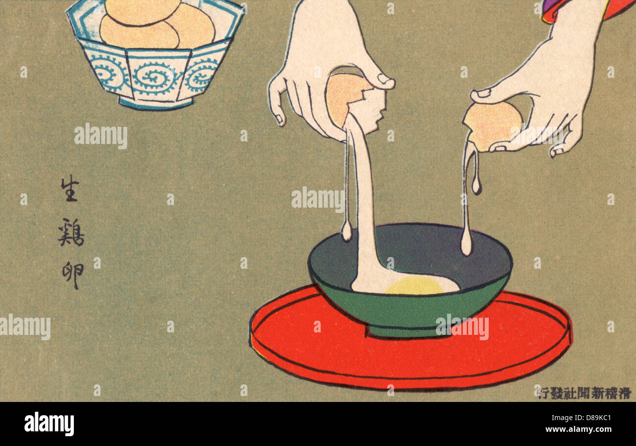 BREAKING AN EGG Stock Photo - Alamy