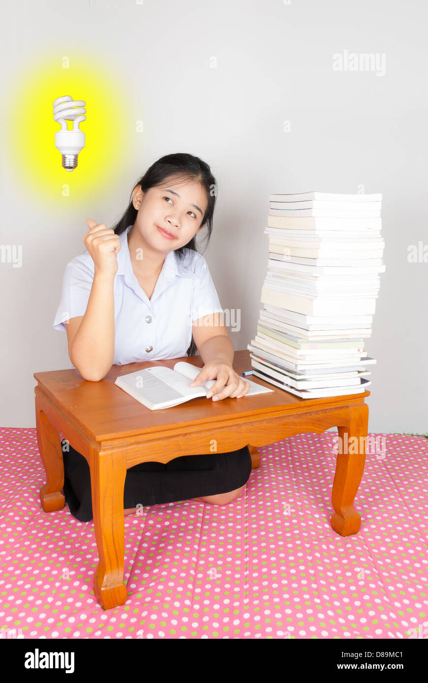 Asian Thai Student getting some cool idea Stock Photo - Alamy