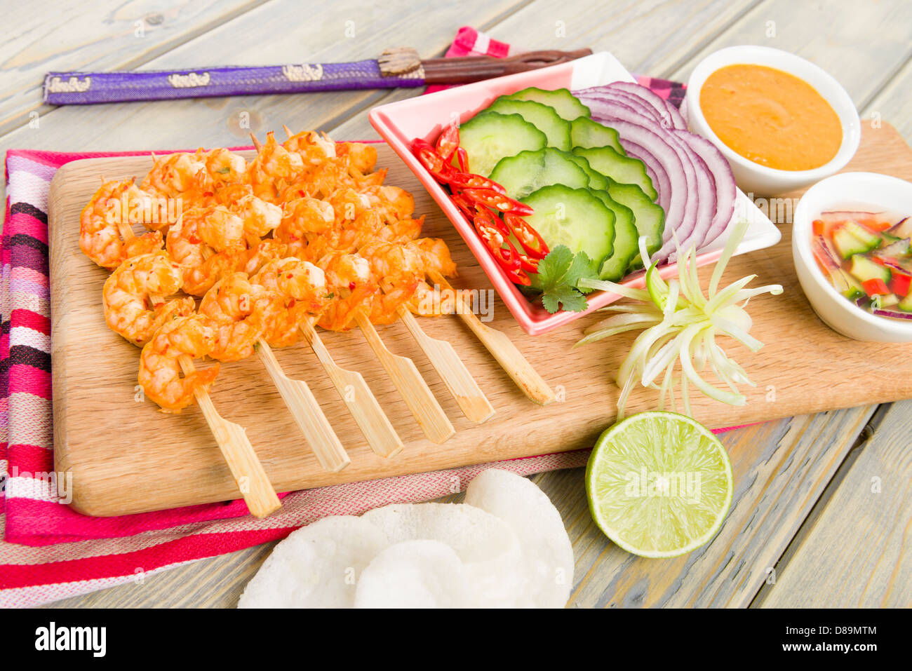 Sate Goong - Thai prawn satay with cucumber and onion relish and peanut ...