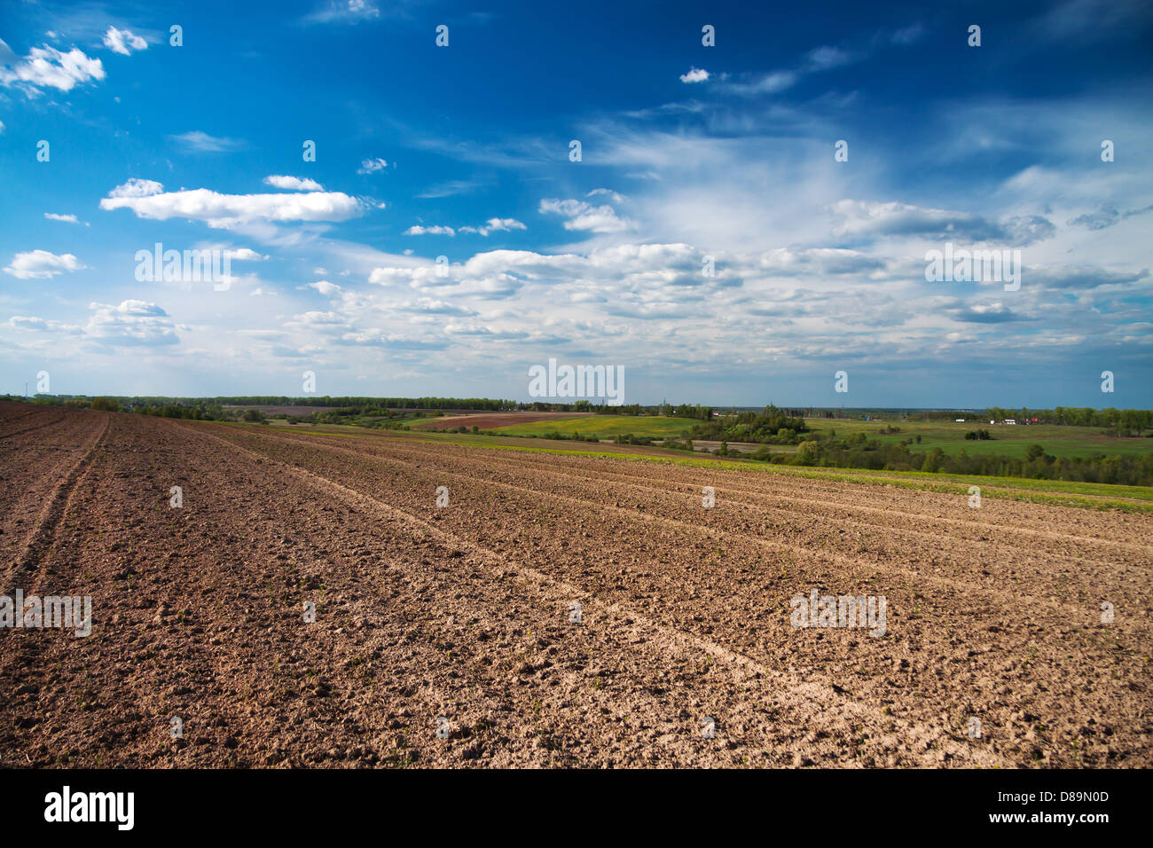 spring landscape with the plowed field Stock Photo - Alamy