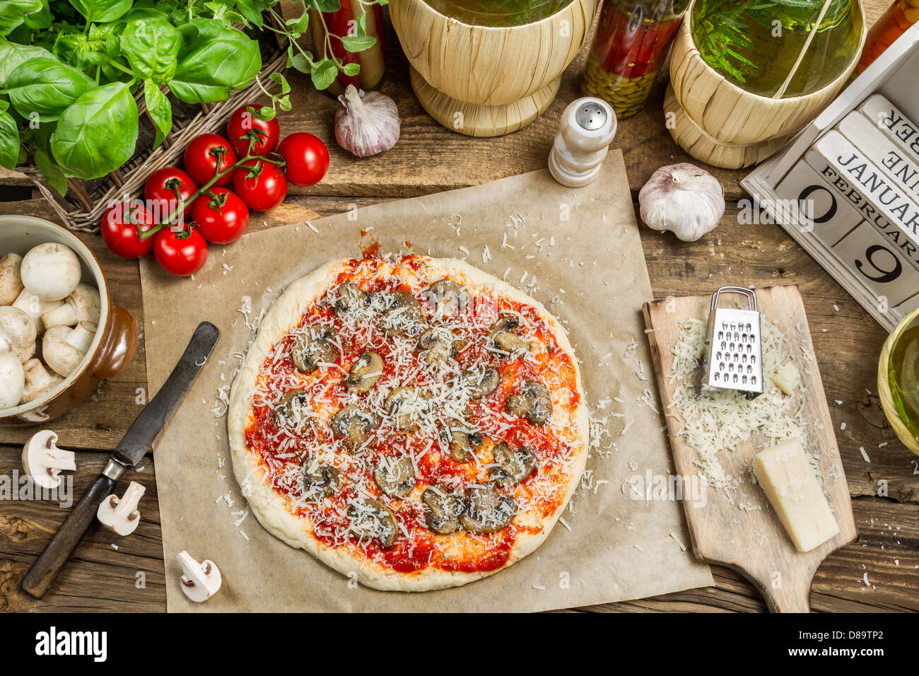 Preparing homemade pizza Stock Photo - Alamy