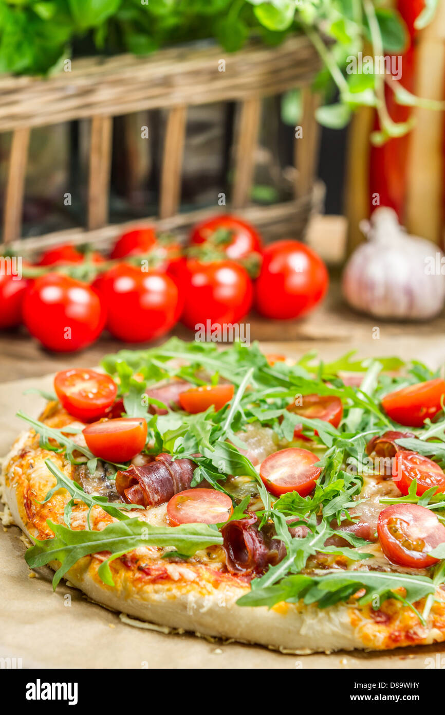 Closeup of homemade pizza with parma ham Stock Photo - Alamy