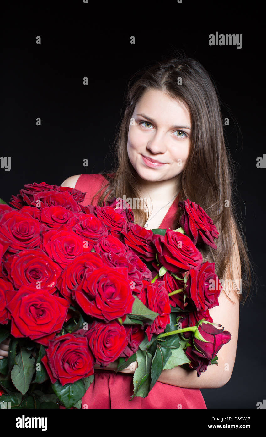 Beautiful girl with roses Stock Photo - Alamy