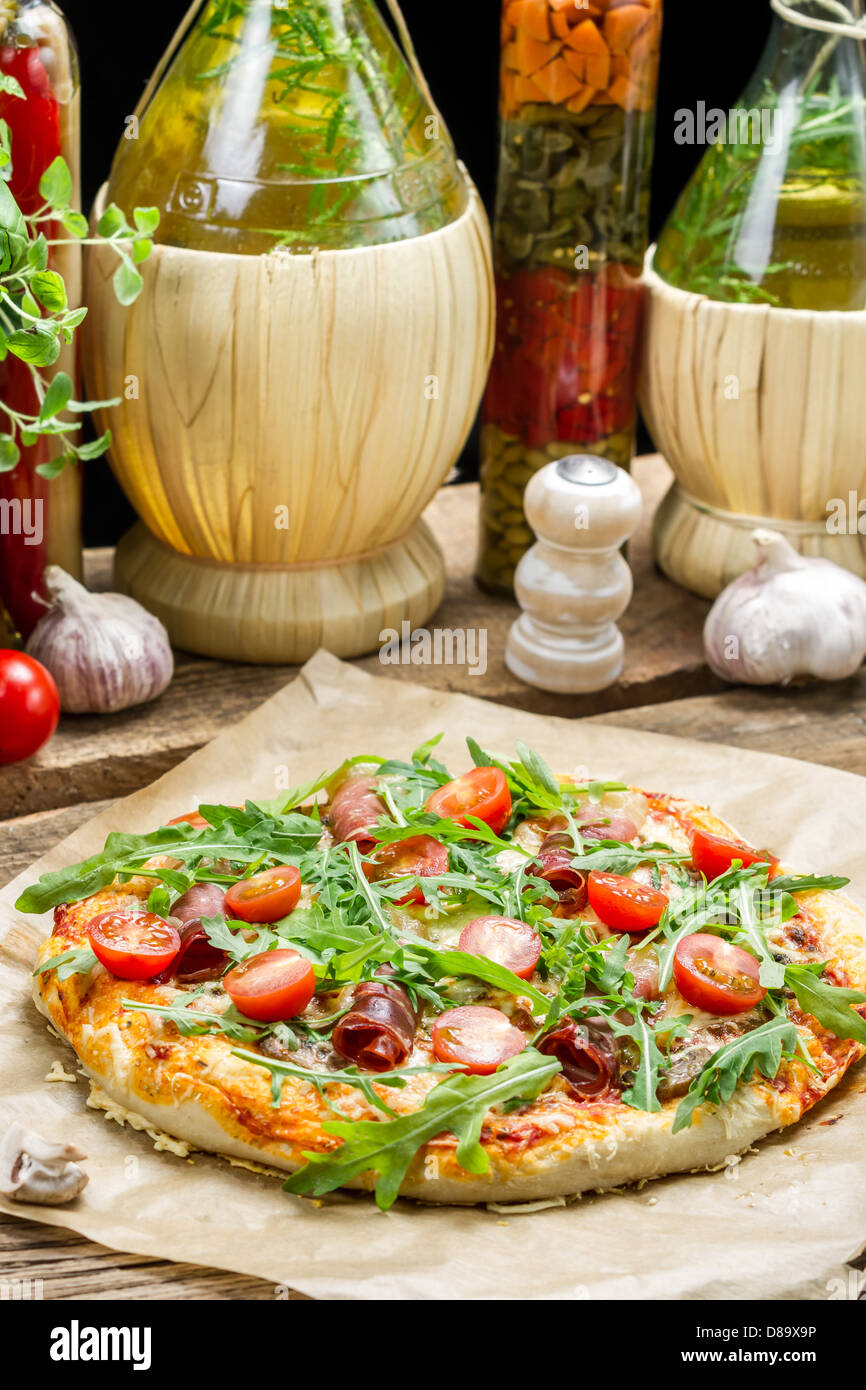 Homemade pizza with parma ham Stock Photo - Alamy