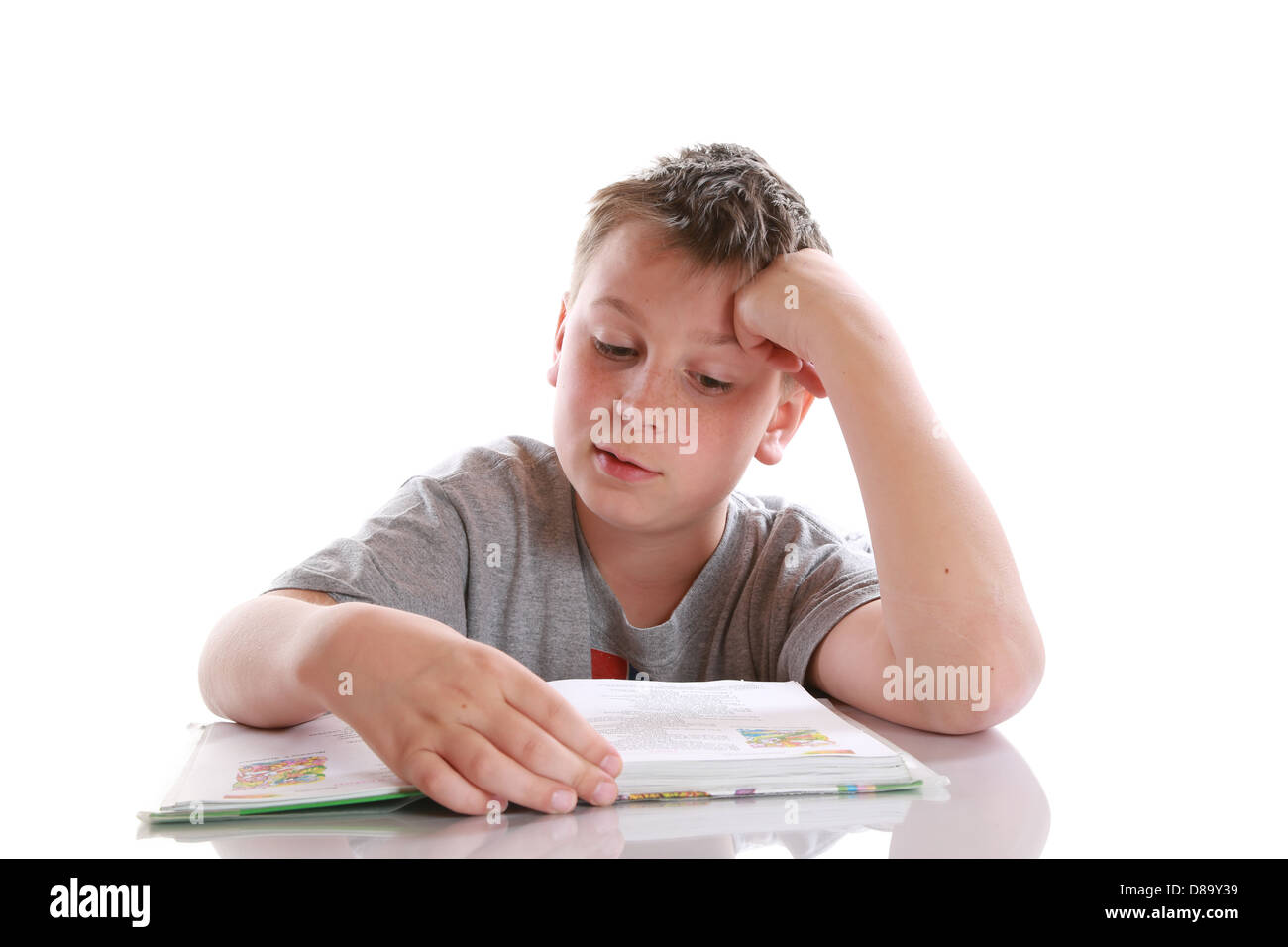 boy reading a book on a white background Stock Photo - Alamy
