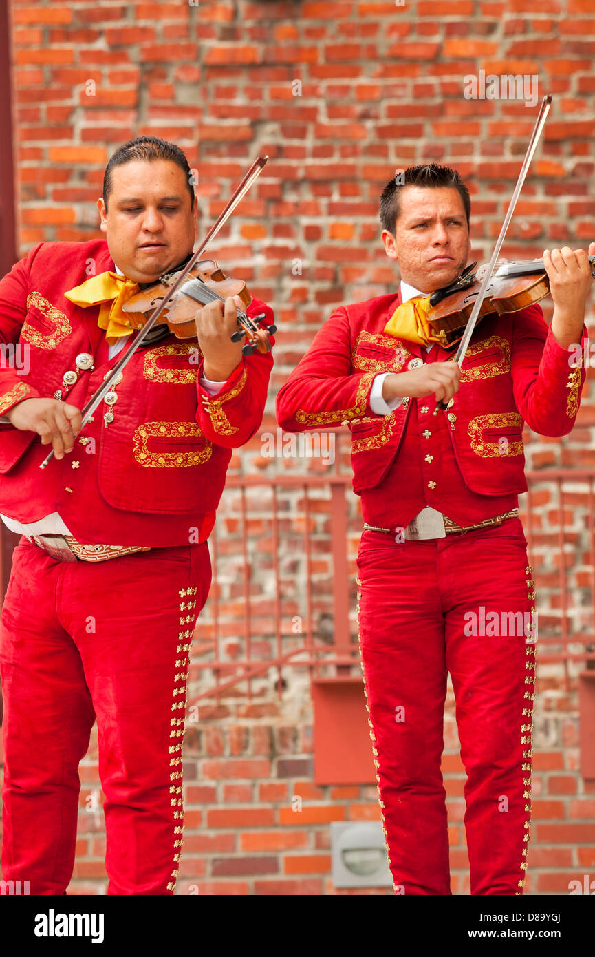 Mexican Mariachi singers and dancers performing in Centennial Square at ...