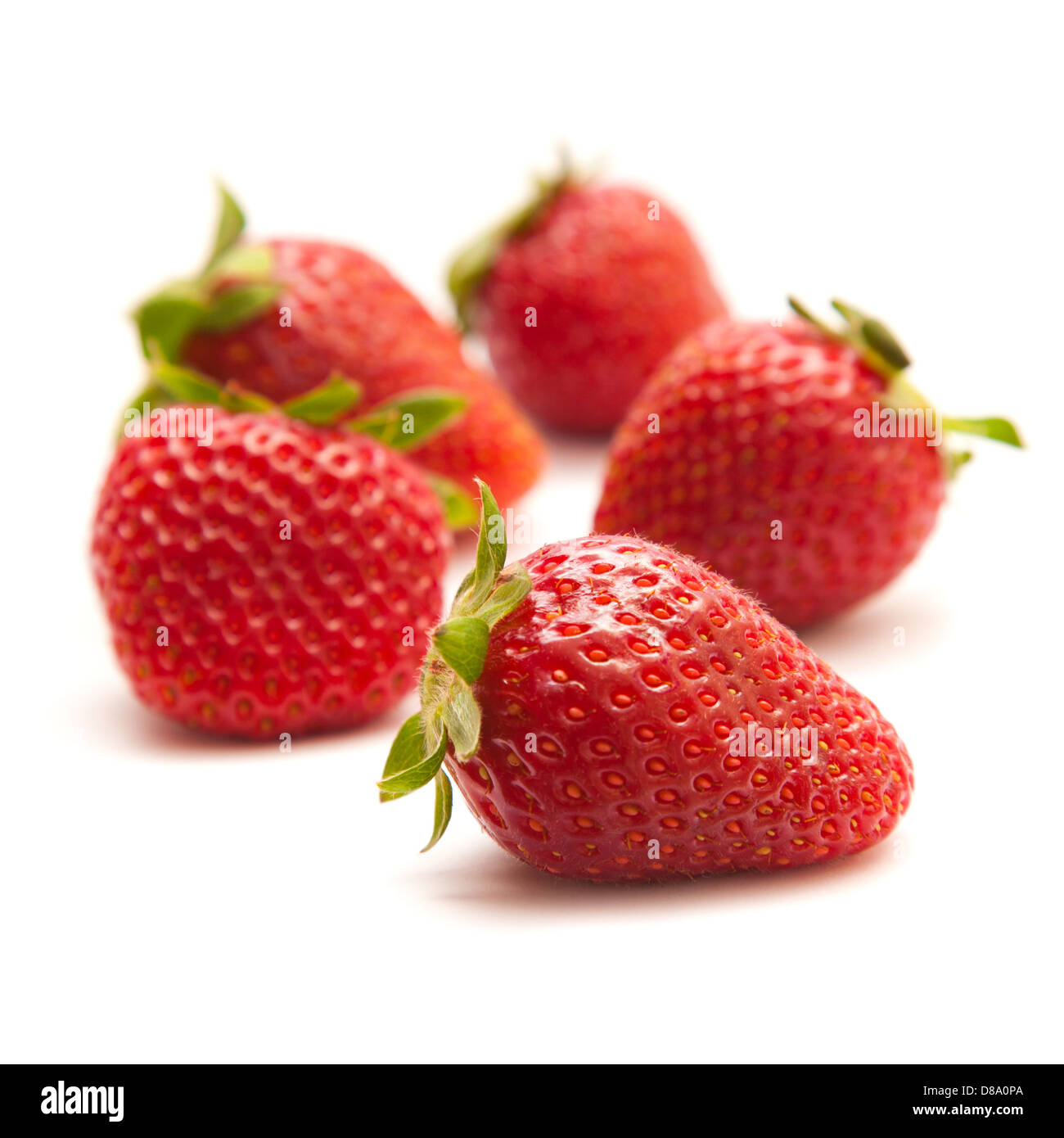 strawberry isolated on white surface Stock Photo - Alamy