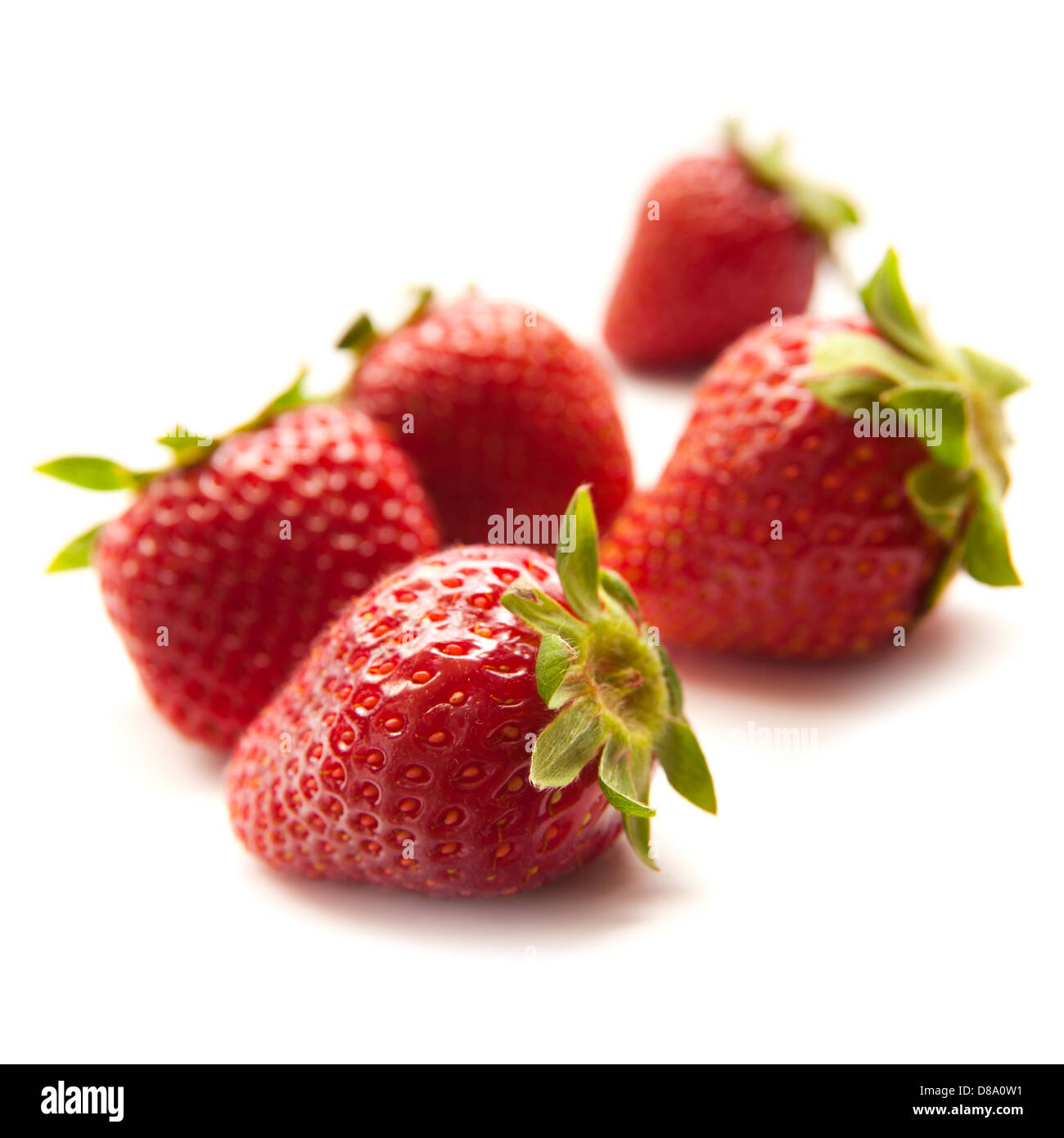 strawberry isolated on white surface Stock Photo - Alamy