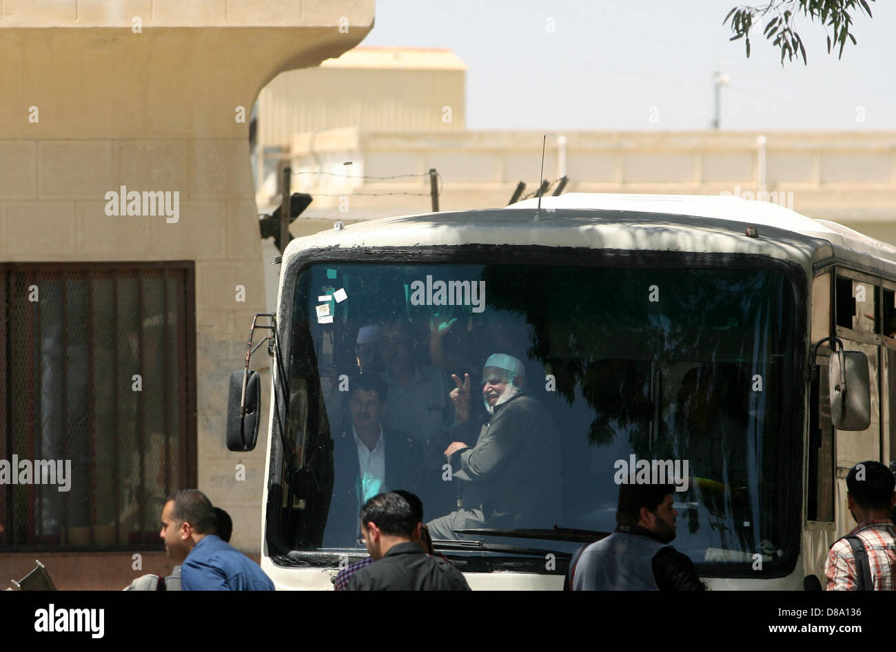 Rafah, Gaza Strip. May 22, 2013. Palestinians see from inside a bus as ...