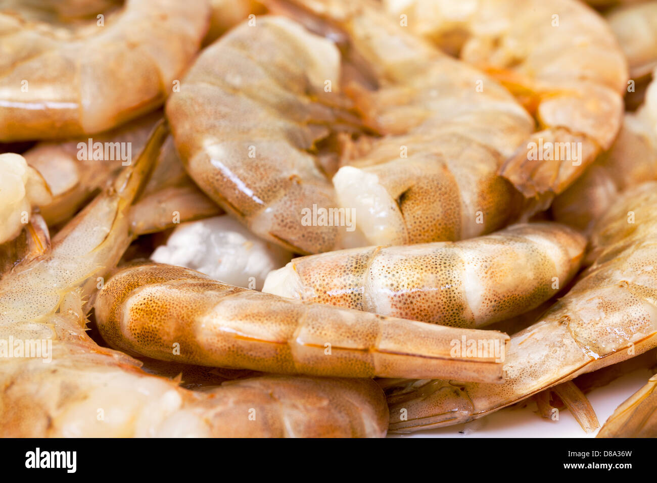Raw headless prawns closeup, backdrop Stock Photo - Alamy