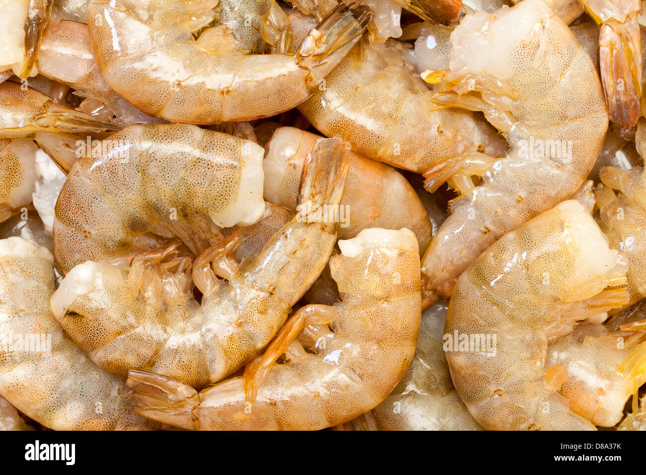 Raw headless prawns closeup, backdrop Stock Photo - Alamy