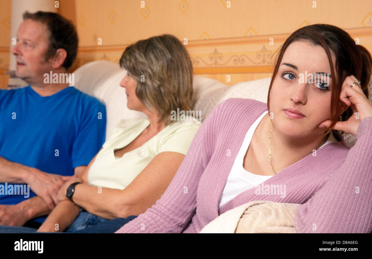 teenage girl distressed by parents quarrelling Stock Photo - Alamy