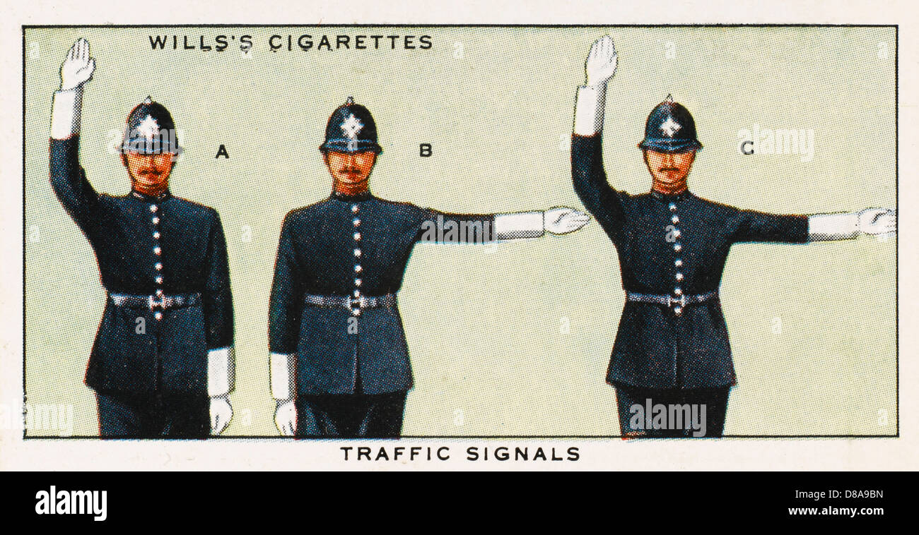 Policeman Signals Stop Stock Photo - Alamy