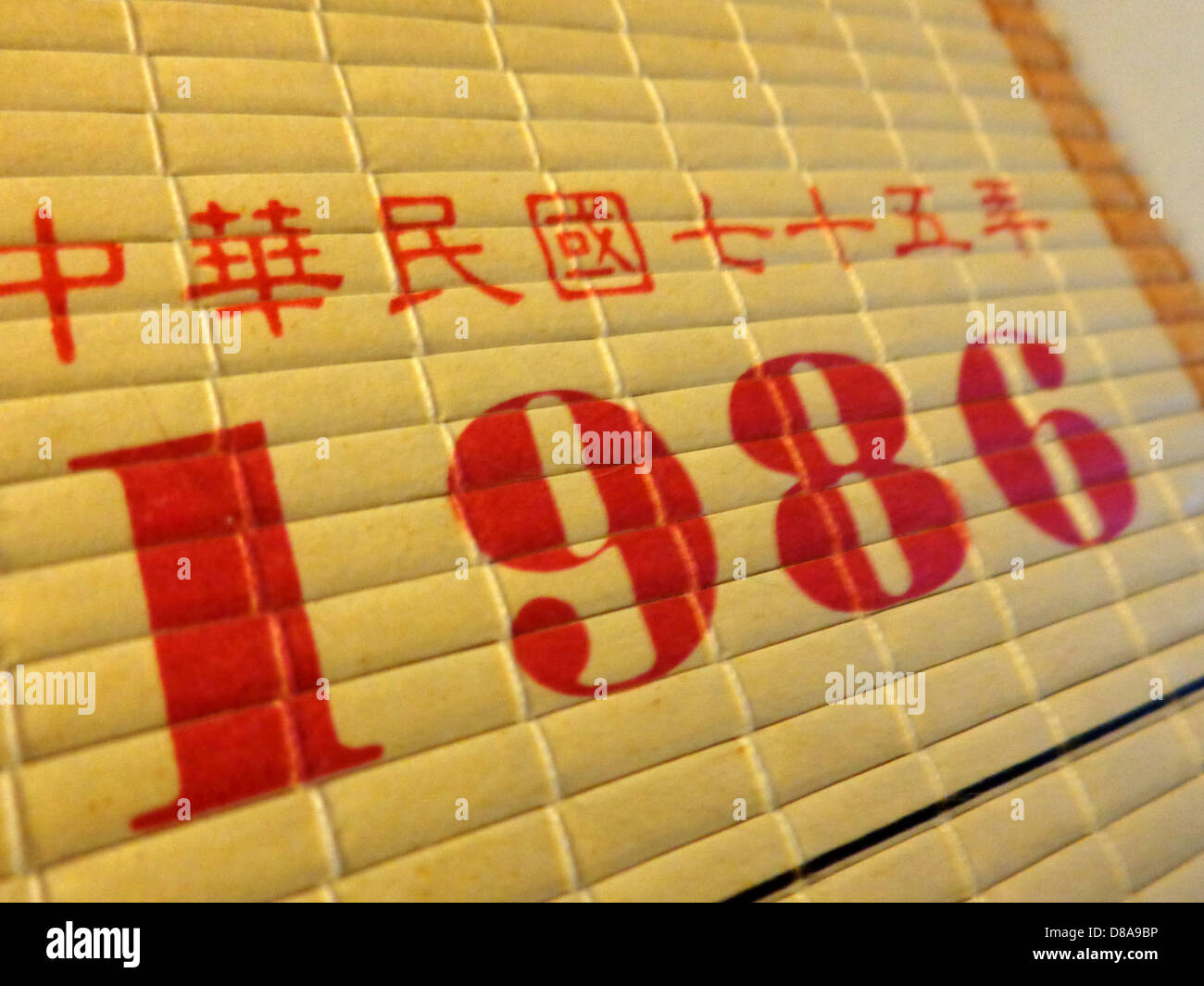A Chinese bamboo calendar from 1986, showing the printed year in ...